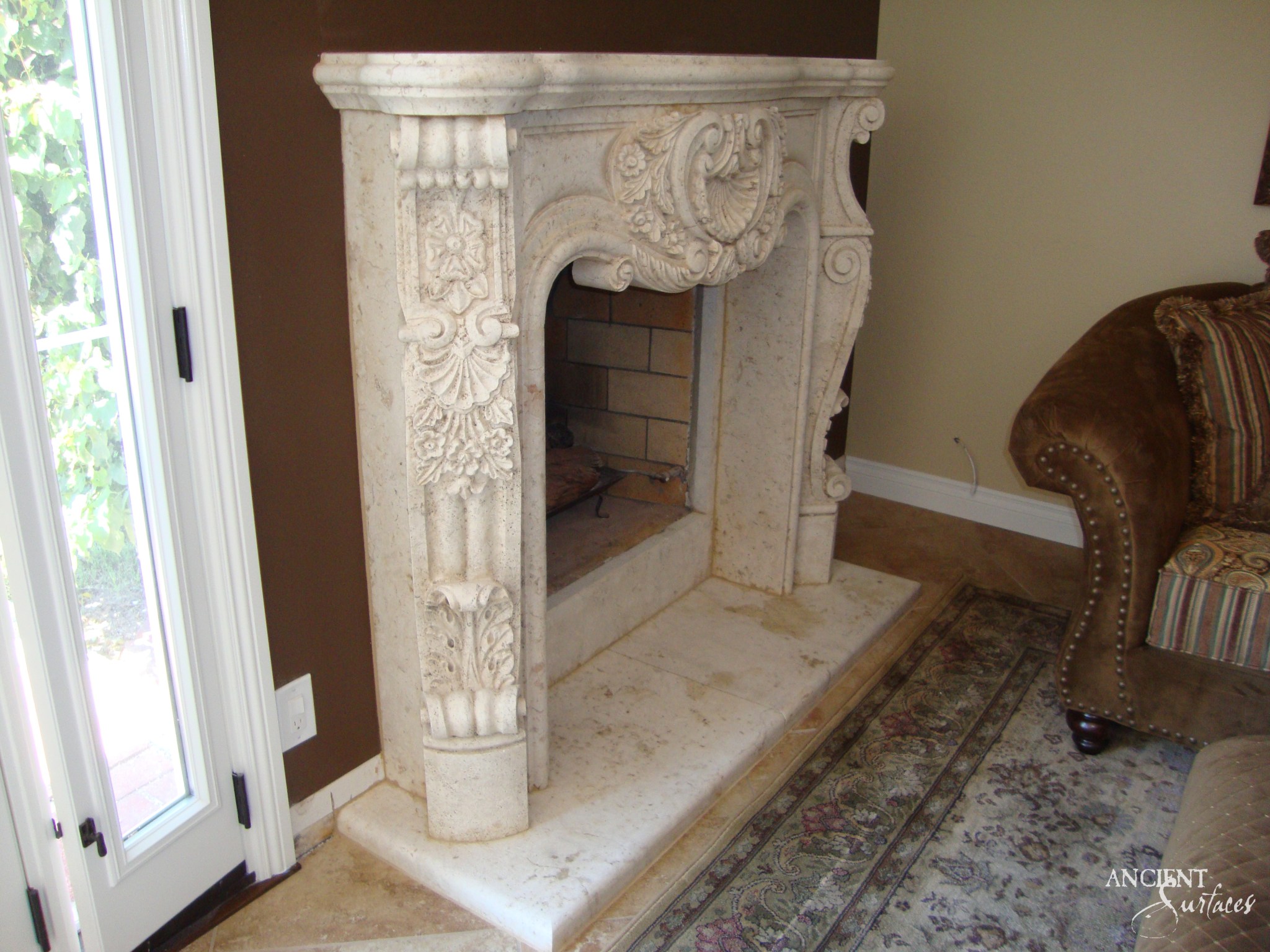 The Architectural Elegance of Antique Limestone Mantles by Ancient Surfaces