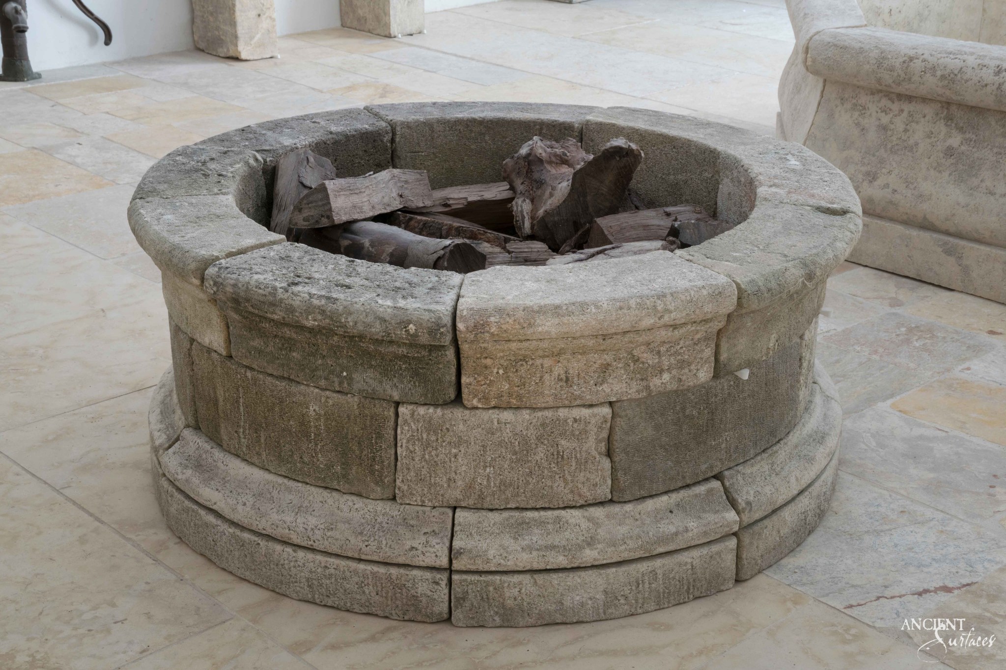 The Timeless Appeal of Antique Limestone Fire Pits by Ancient Surfaces